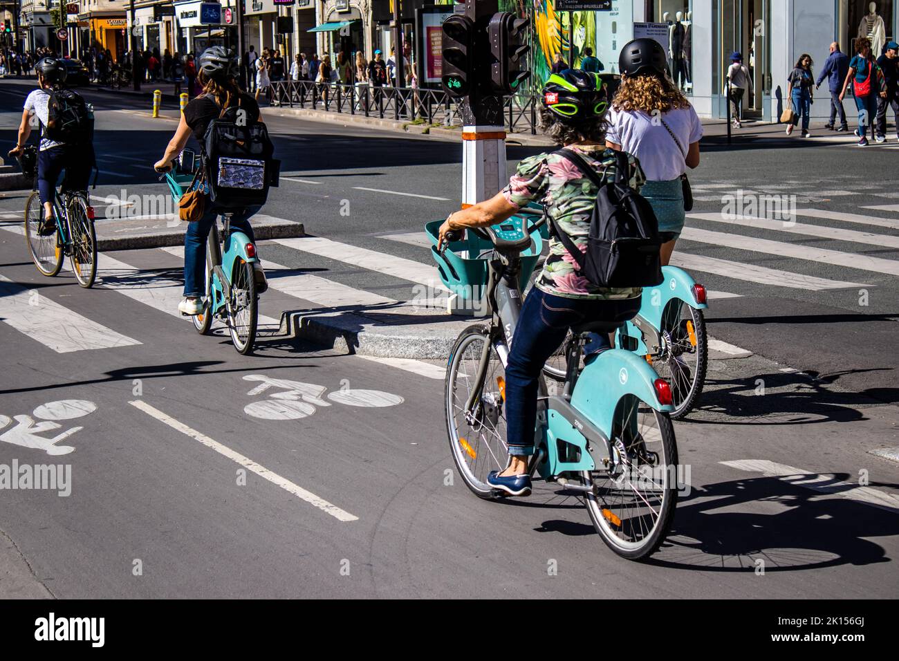 Paris, France - September 12, 2022 People cycling on the streets ...