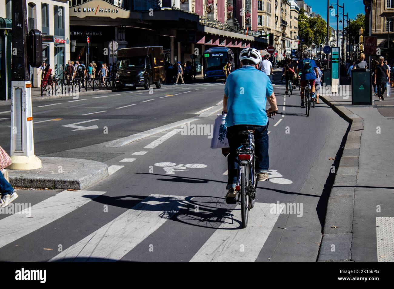 Paris, France - September 12, 2022 People cycling on the streets ...