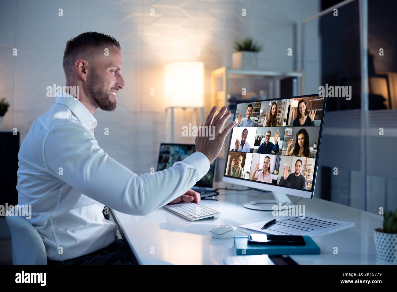 Online Business Meeting Call On Computer At Night Stock Photo - Alamy