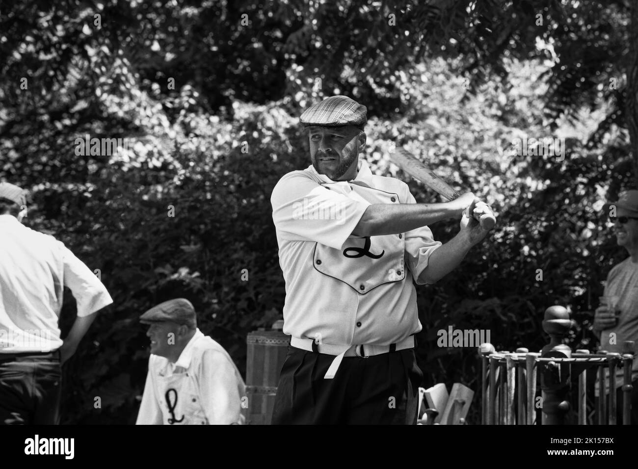 A baseball player practices his swing. Vintage baseball with 1860 rules ...