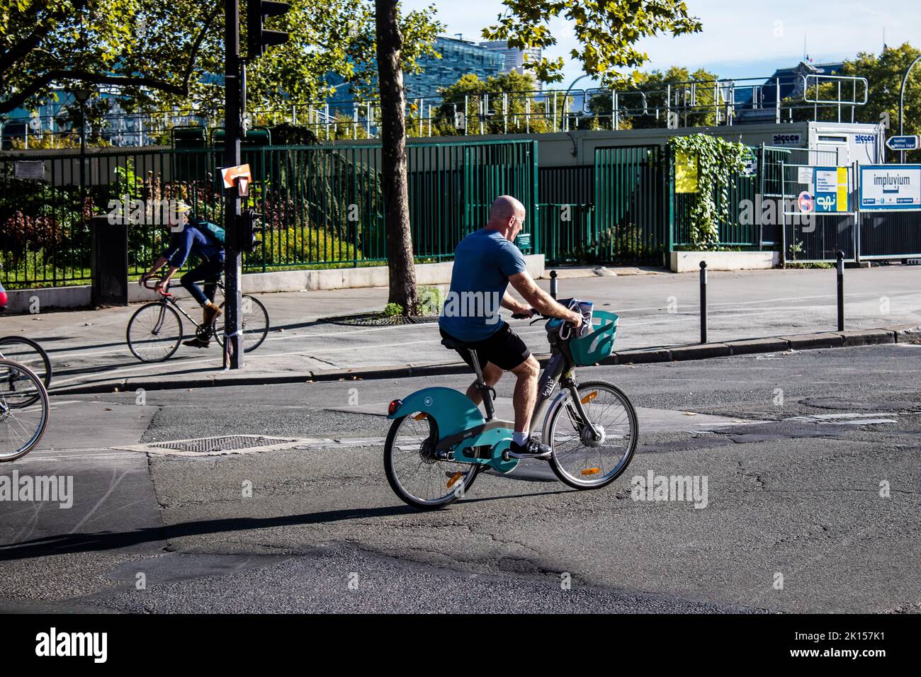 Paris, France - September 12, 2022 People cycling on the streets ...
