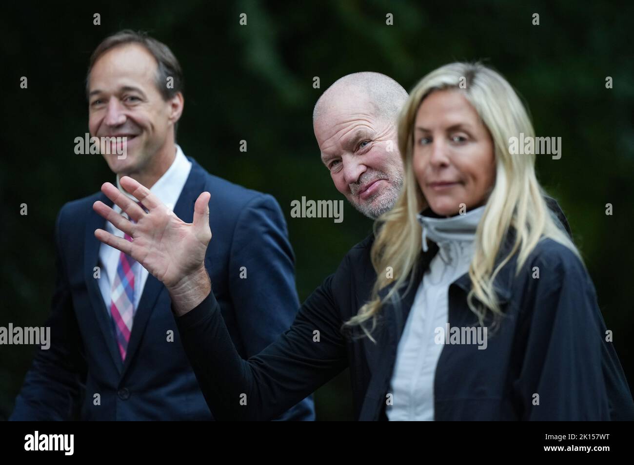 Lululemon founder Chip Wilson, centre, and his wife Summer Wilson stand ...