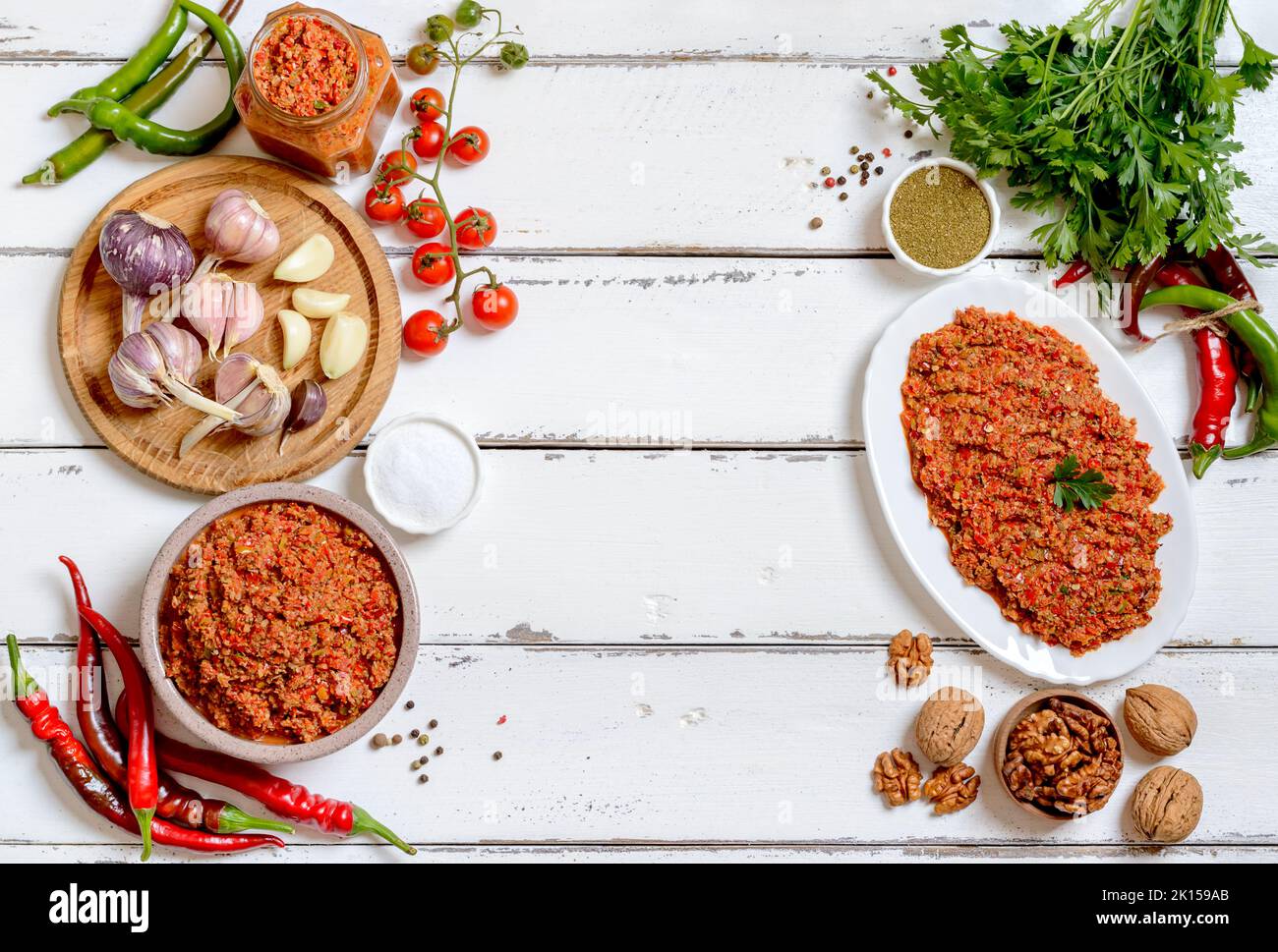 Adjika and ingredients. Georgian cuisine. Fresh vegetables, spices ...