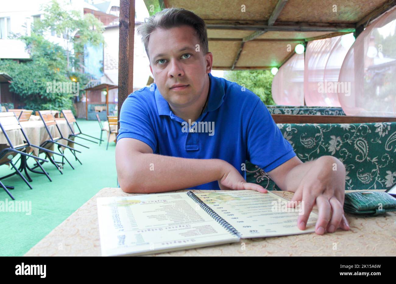 Young person menu confused hi-res stock photography and images - Alamy