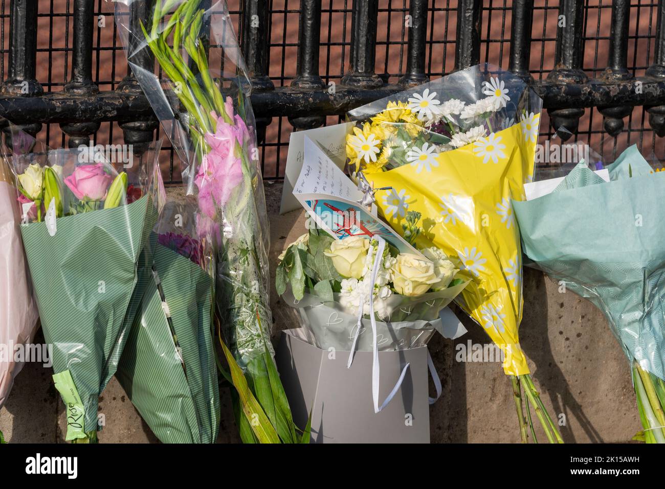 Flowers and messages left outside Buckingham Palace following the death of Queen Elizabeth II ...