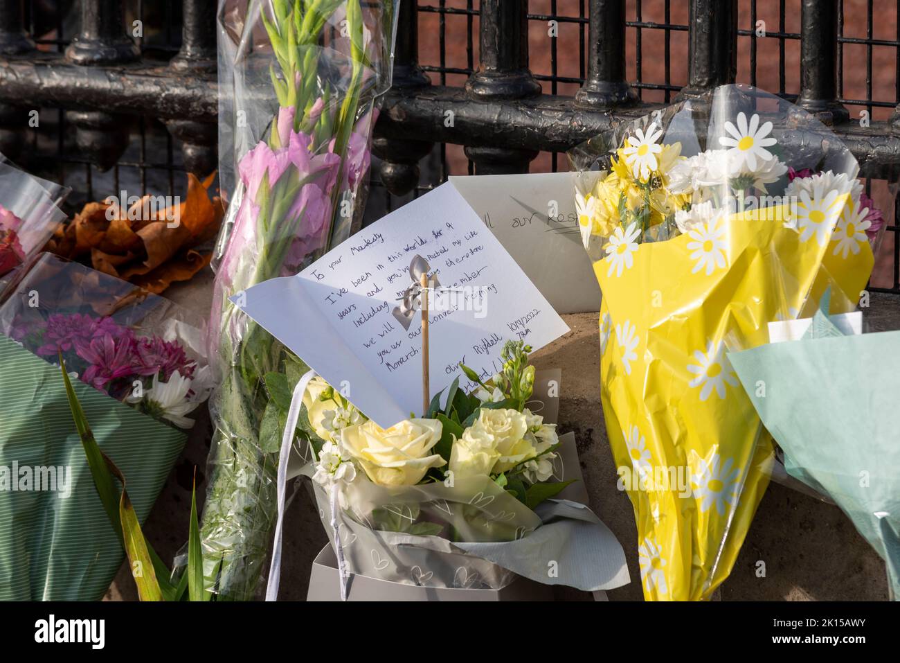 Flowers and messages left outside Buckingham Palace following the death of Queen Elizabeth II ...