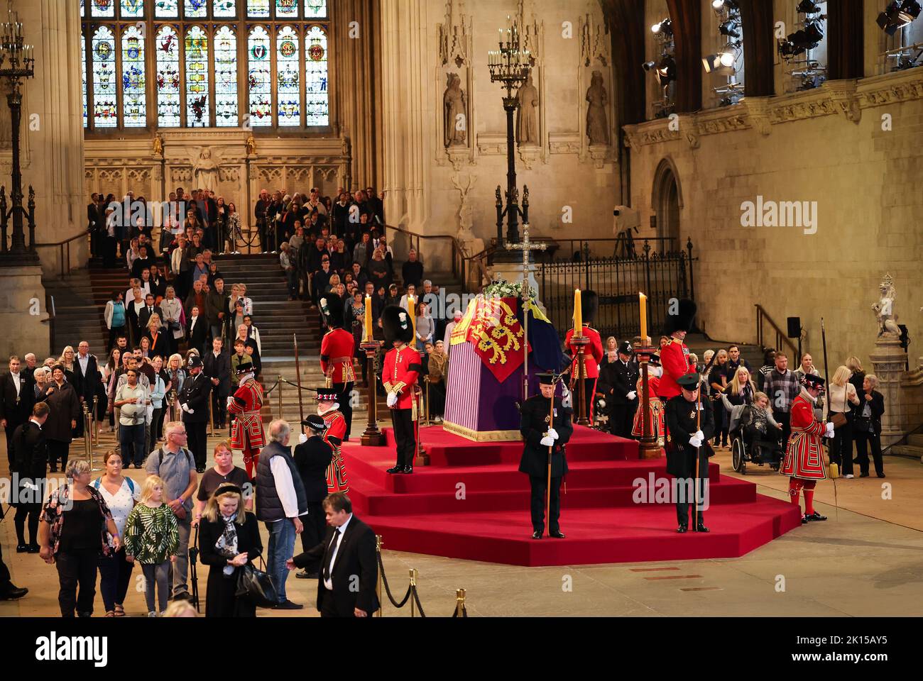 London, UK. 15th Sep, 2022. Mourners slowly walk past the coffin with Queen Elizabeth II in ...