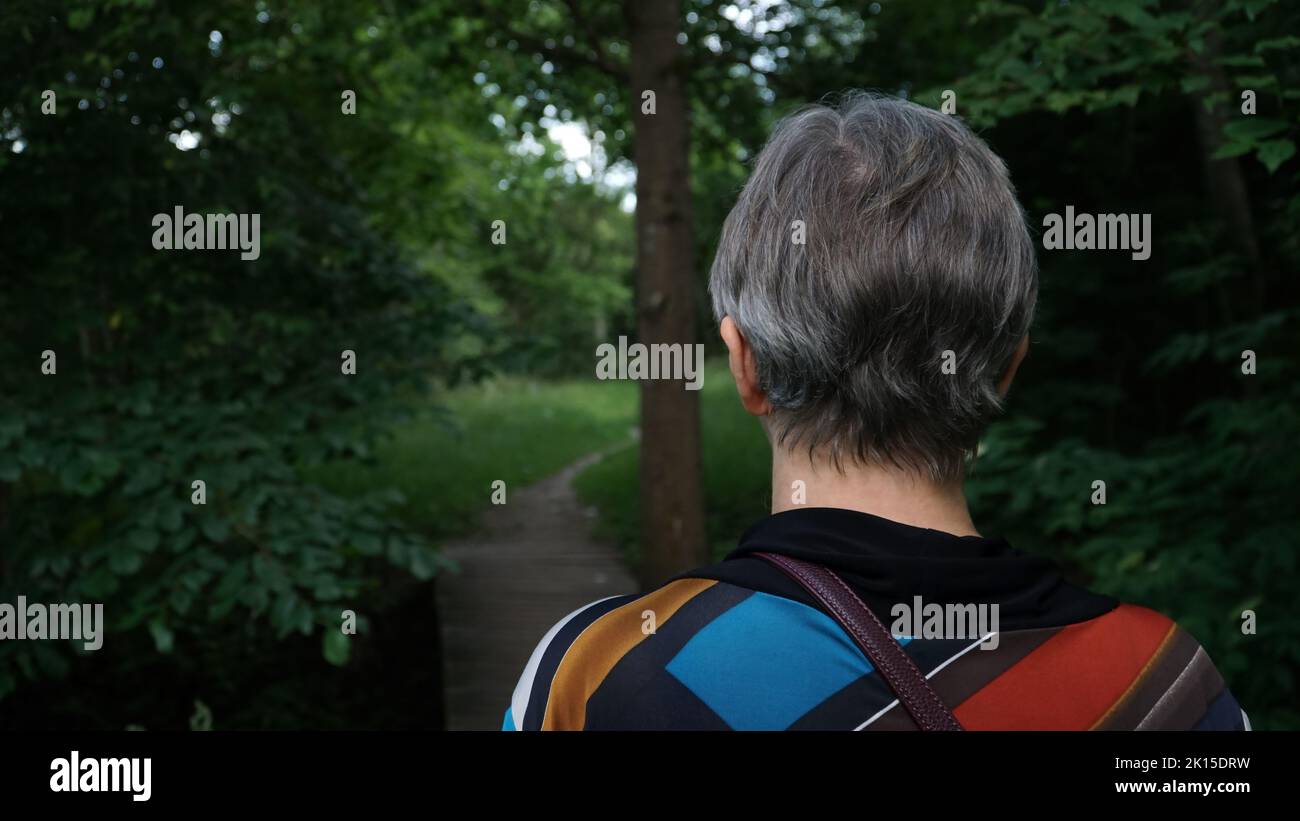 The path of human life. A woman faces a daunting choice. A symbolic ...