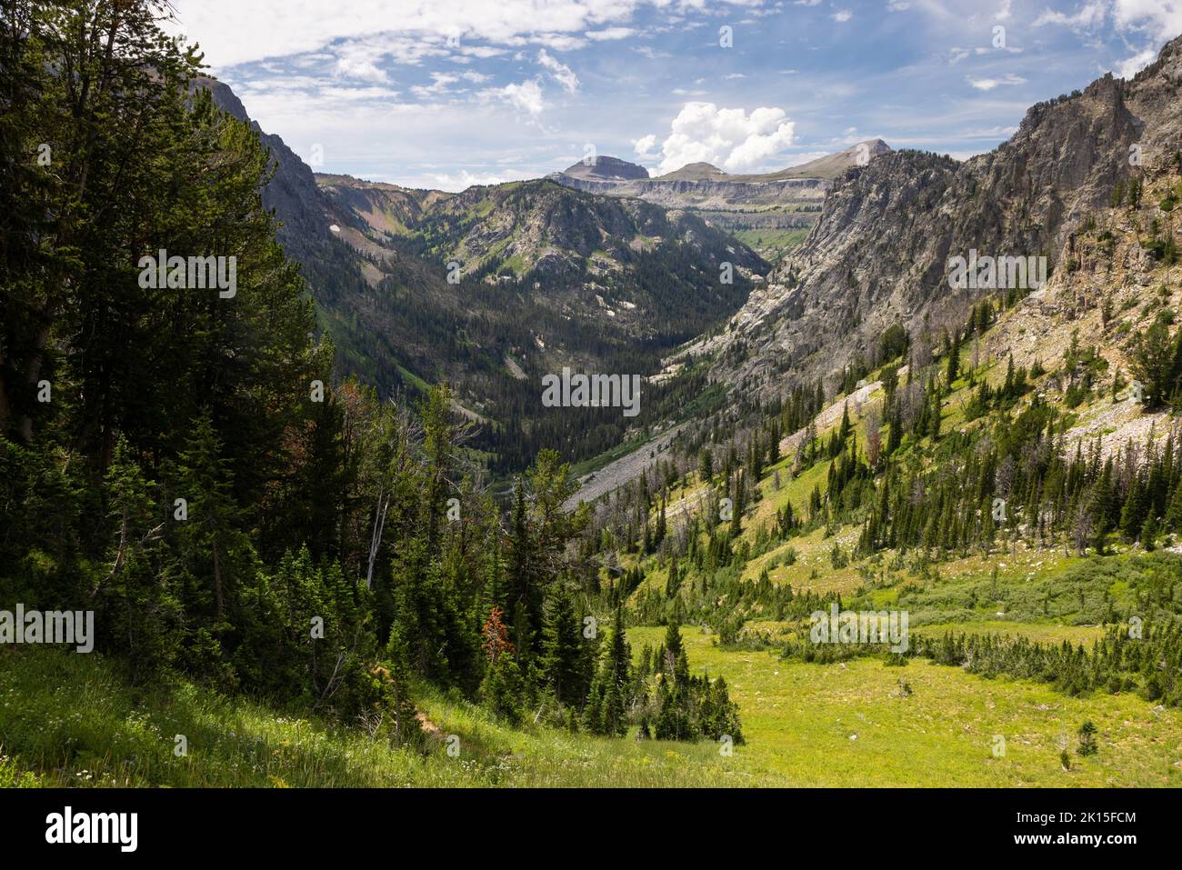 Death Canyon winding into the distance below its cliffs and peaks ...