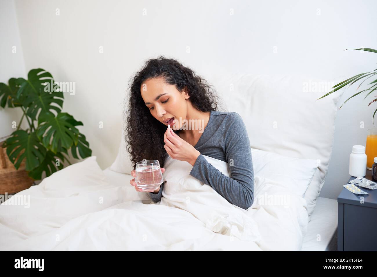 Young sick woman thermometer hi-res stock photography and images - Alamy