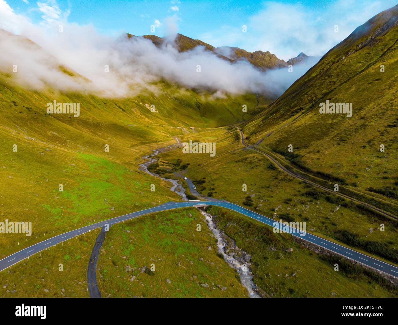 Winding road in mountain passes Stock Photo - Alamy