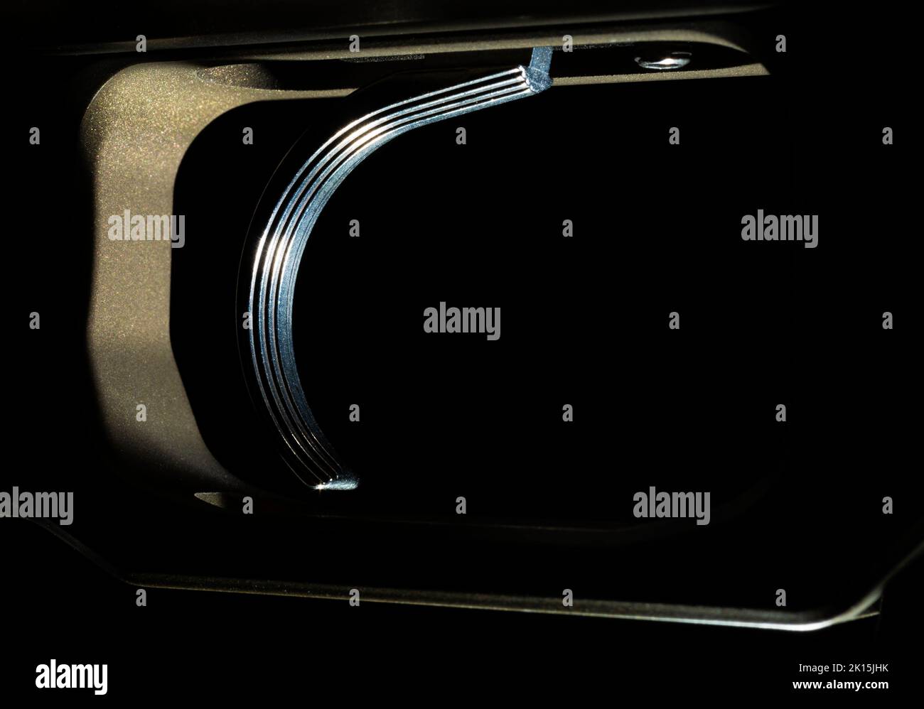 Mysterious looking trigger on a rifle with gold fleck finish Stock ...