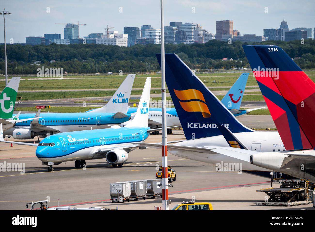 Amsterdam Schiphol Airport, aircraft at terminal, Gates D, check-in ...