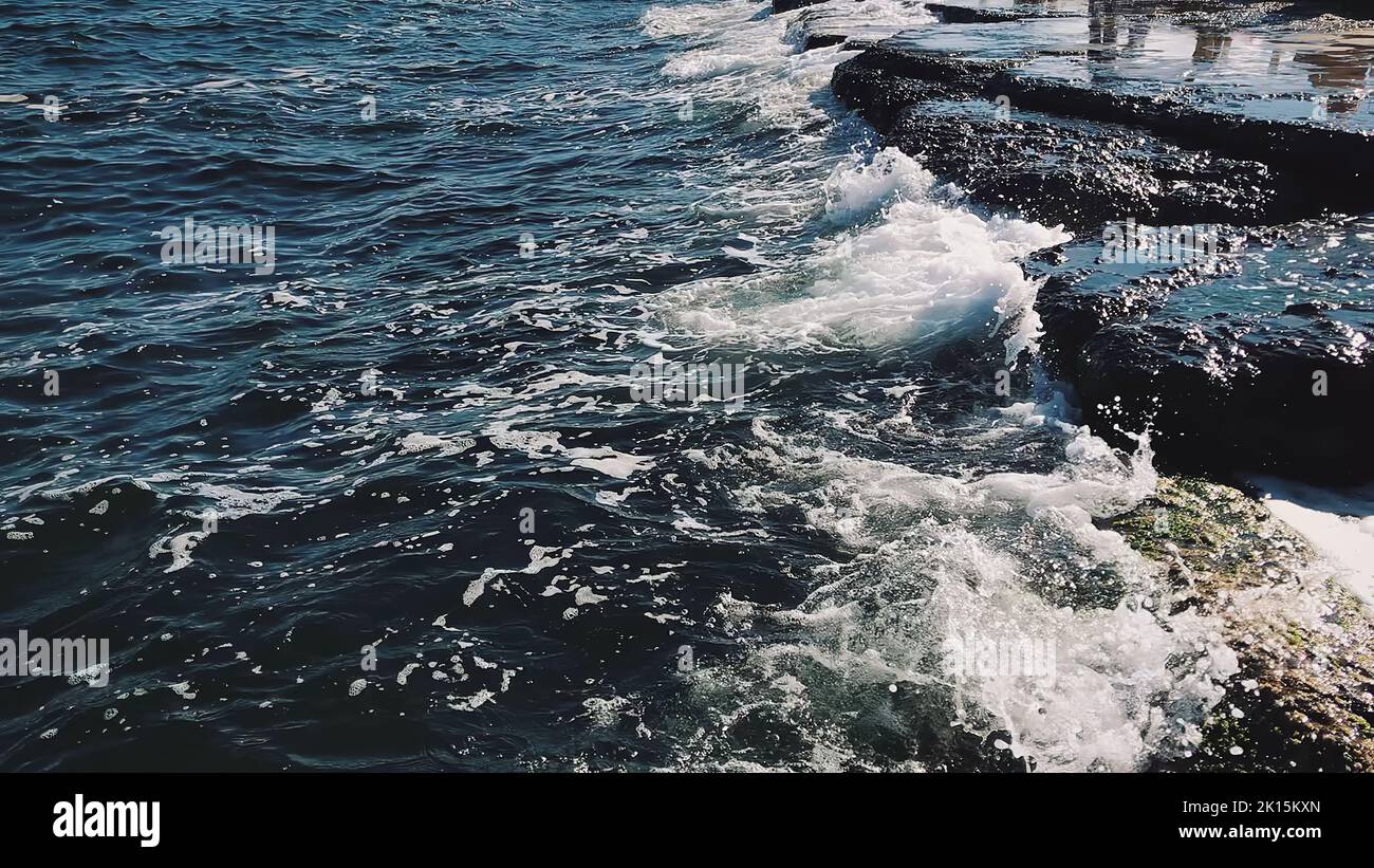 Spectacular Tidal Bore, a wave rolled on rocks Stock Photo - Alamy
