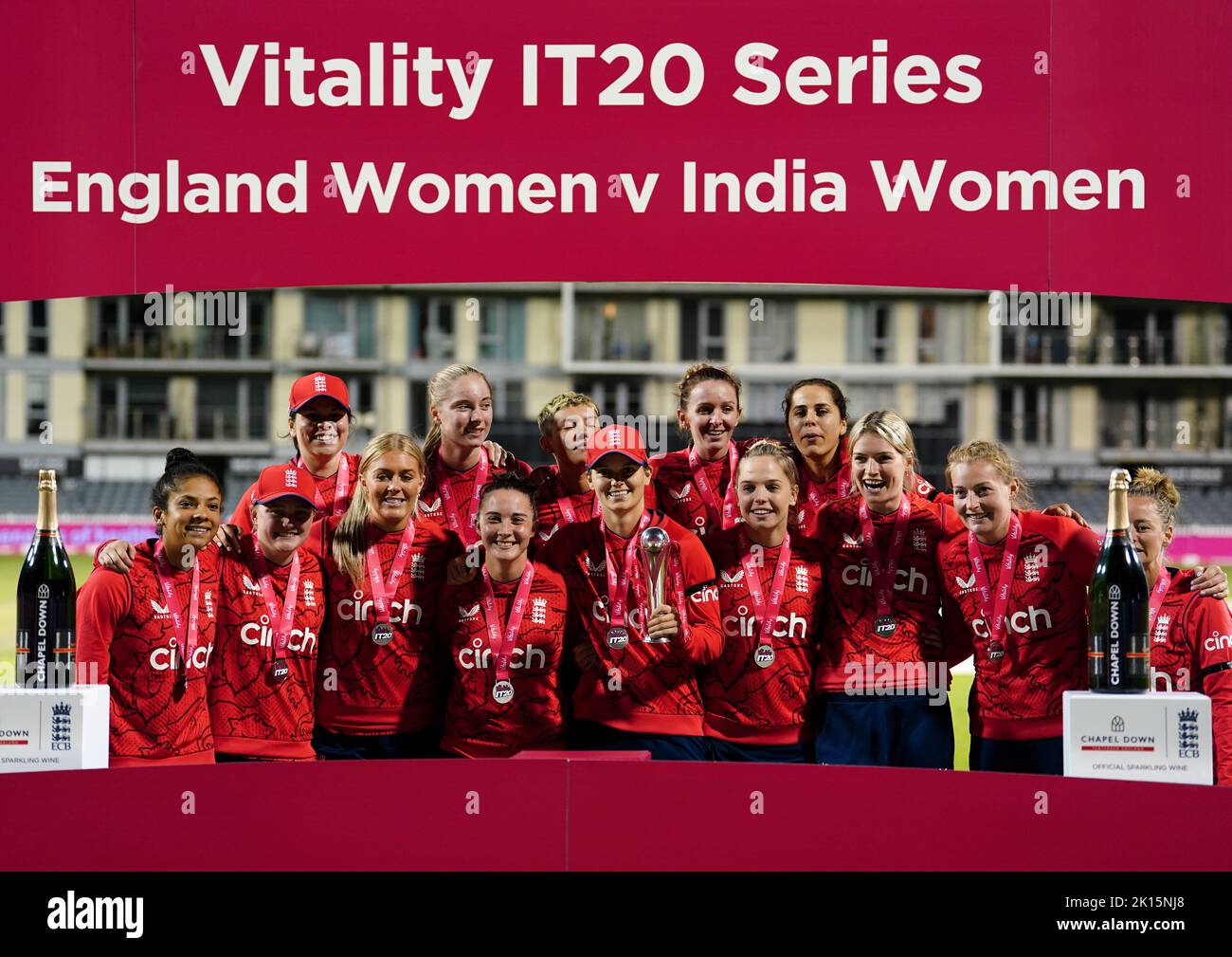 England's Amy Jones (centre) and team-mates celebrate with the trophy ...