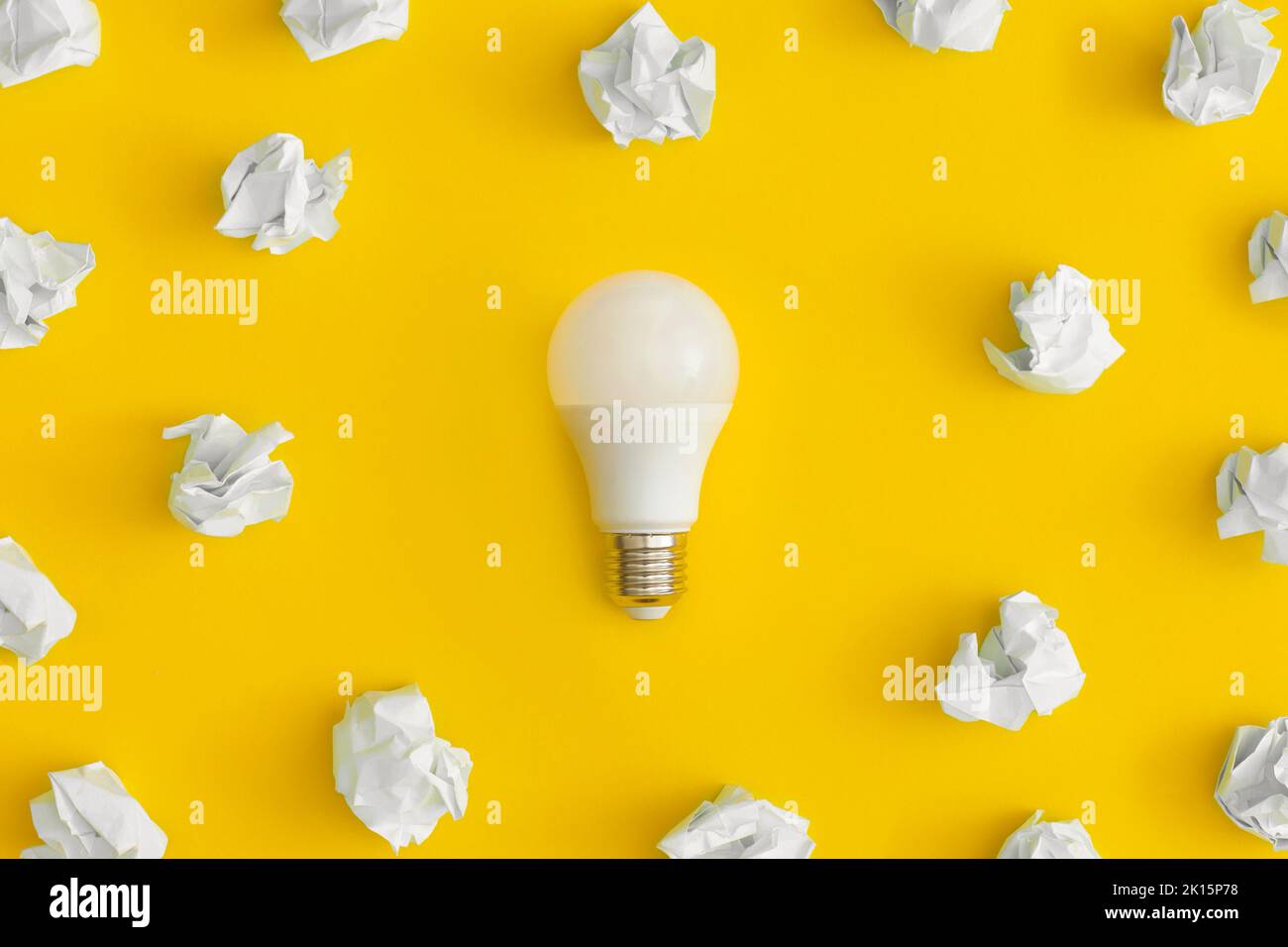 Sticky notes and light bulb on yellow background. Inspiration and ...