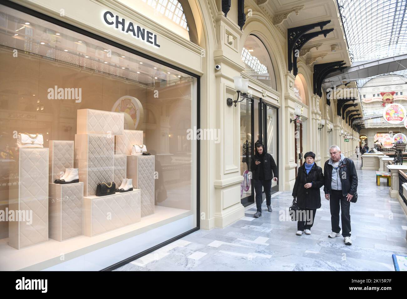 People walk next to the Chanel store at the Gum building Stock Photo ...