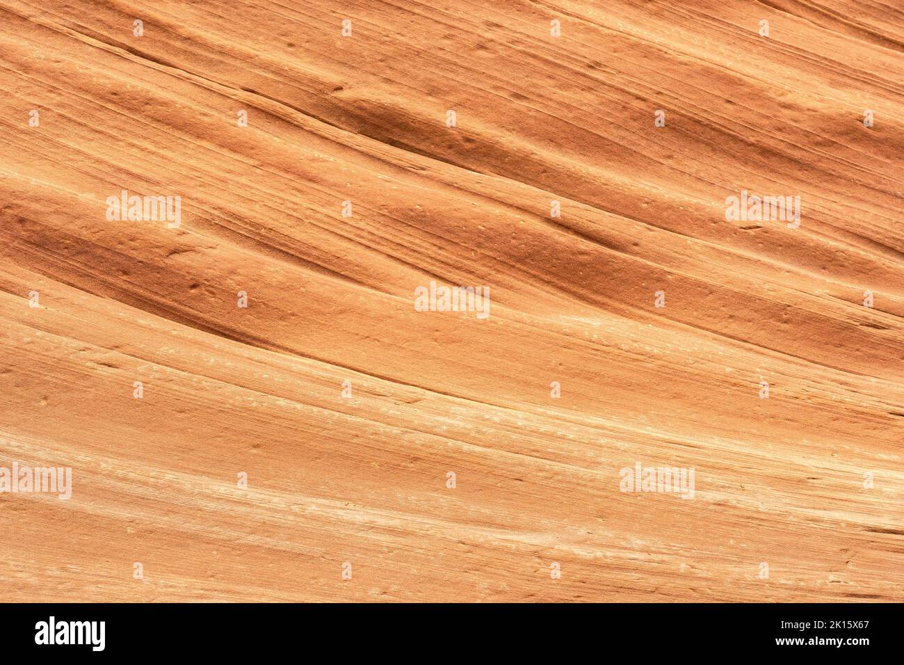 Uneven sandstone surface wall of Little Wild Horse Canyon in daytime in ...