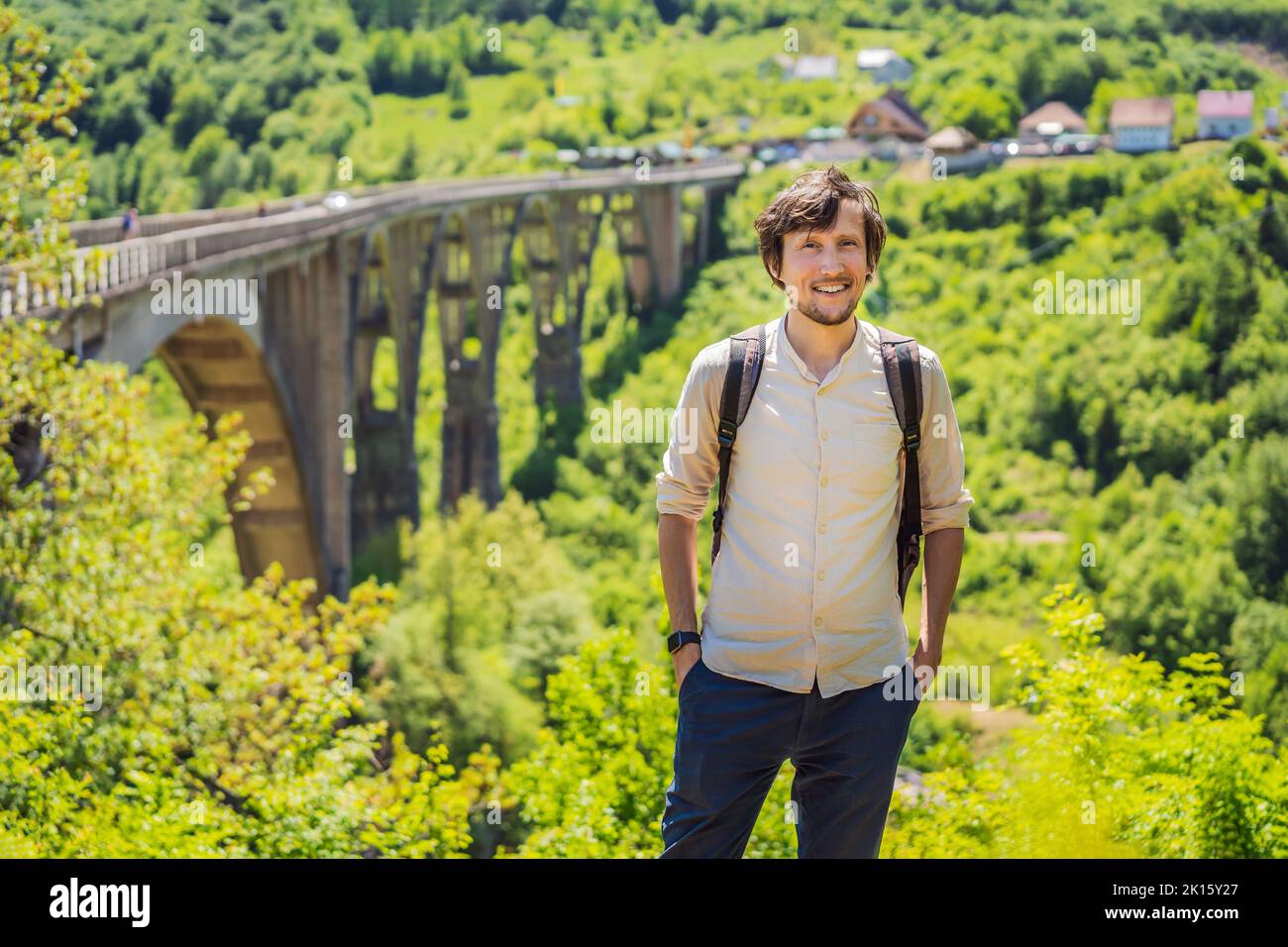 Montenegro. Man tourist in background of Dzhurdzhevich Bridge Over The ...