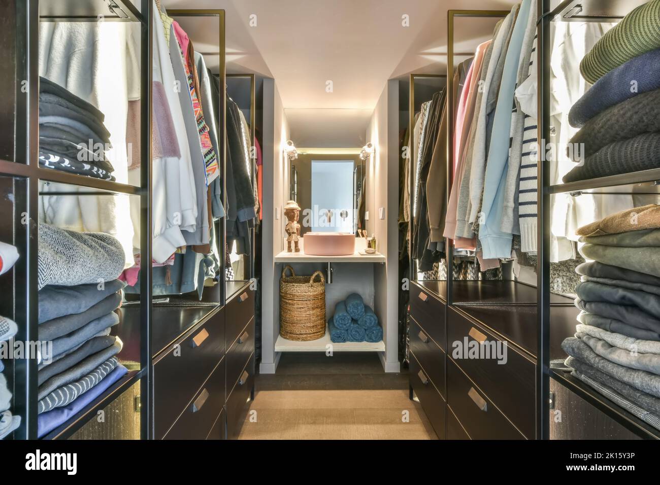 Interior of a dressing room of a modern house with clean and folded ...
