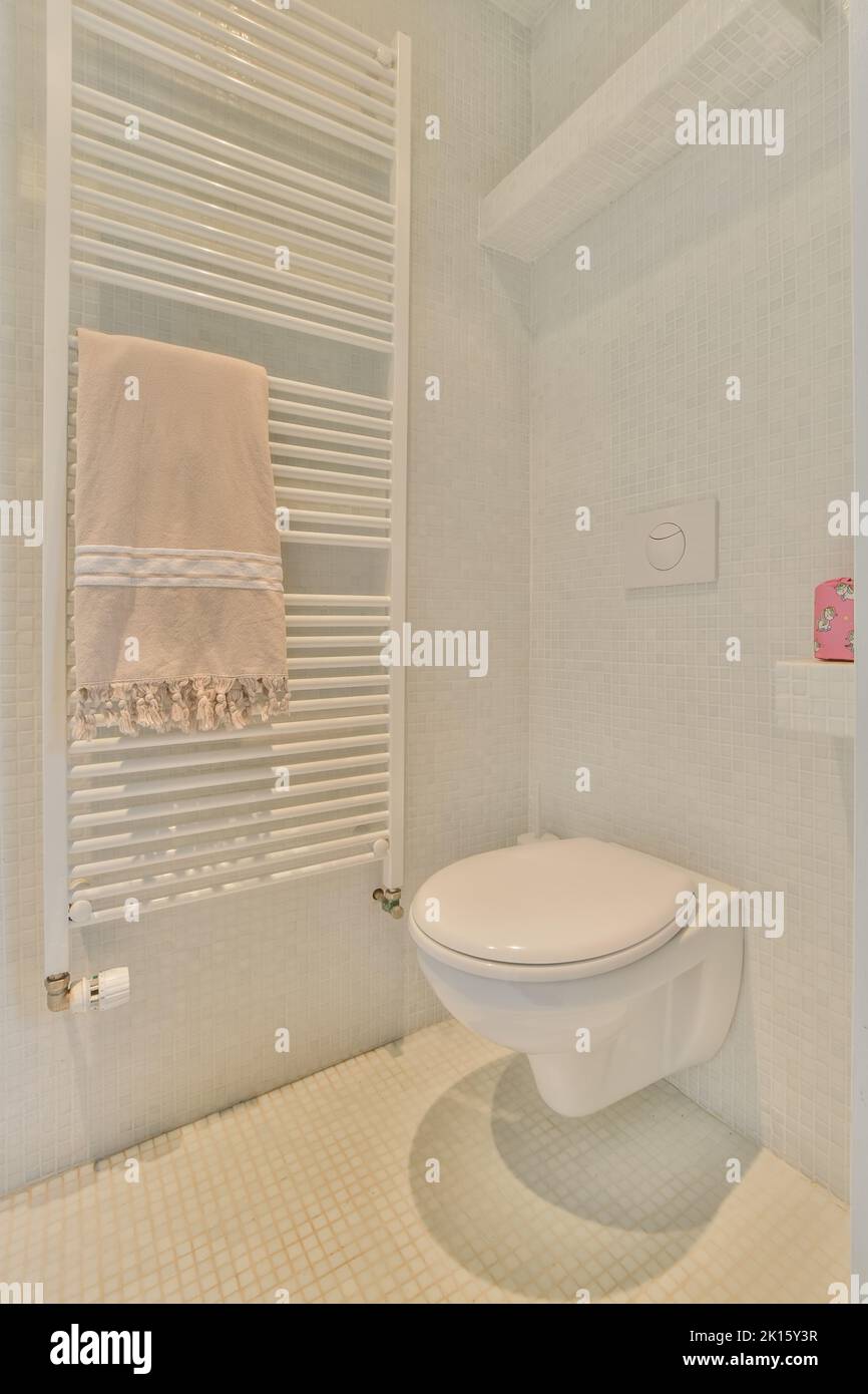 From above toilet bowl in a sink with white and white walls next to a ...