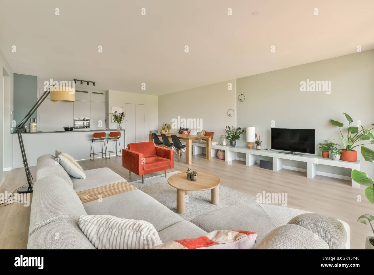 Modern interior of dining room with television by the wall Stock Photo ...