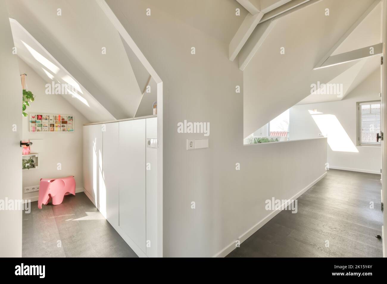 Interior passage way in bright modern house with parquet floor Stock ...
