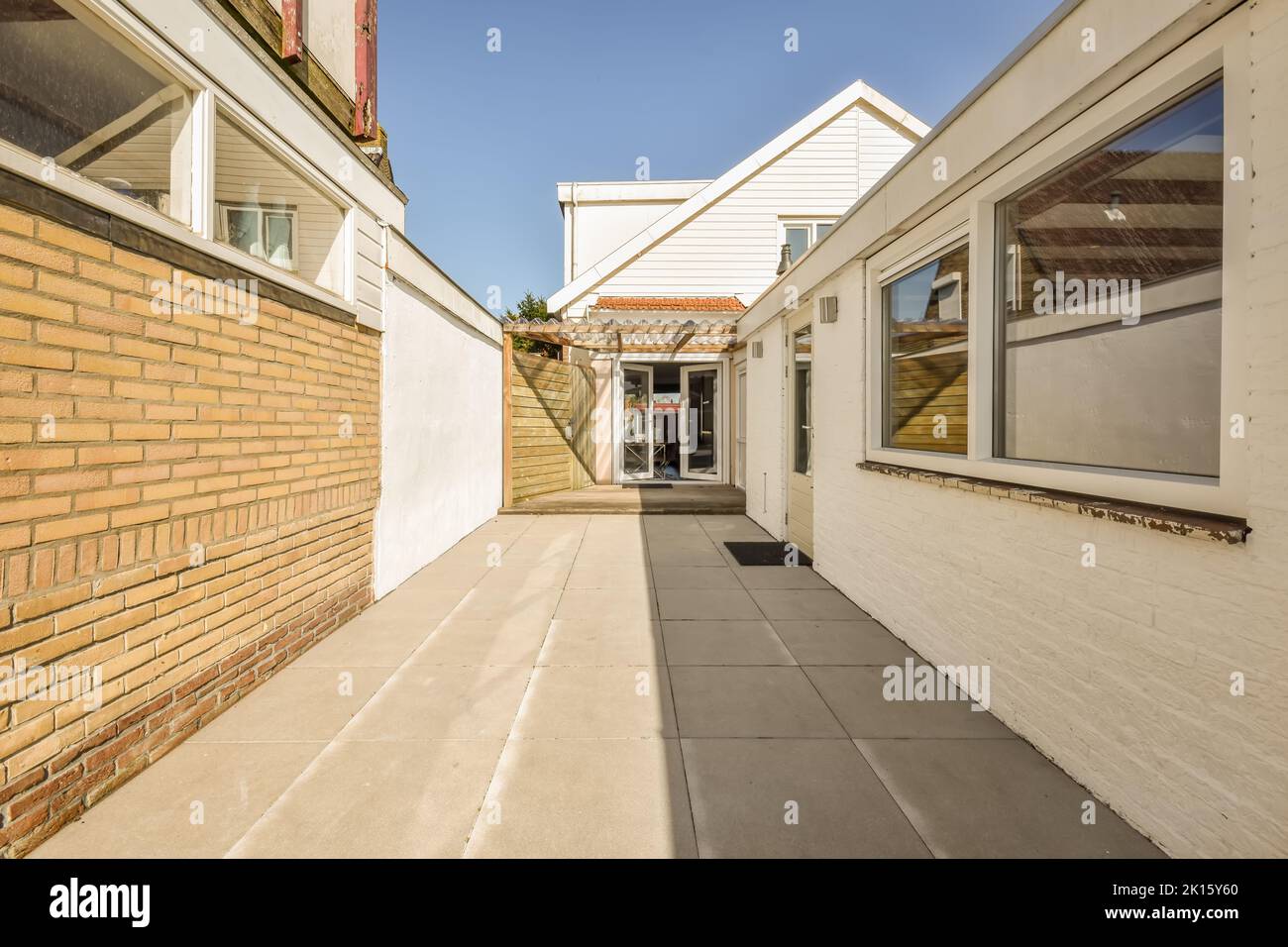 Hallway at the entrance of a modern house with transparent roof next to ...