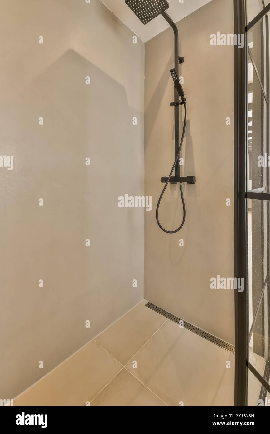Interior of a modern shower with white walls Stock Photo - Alamy