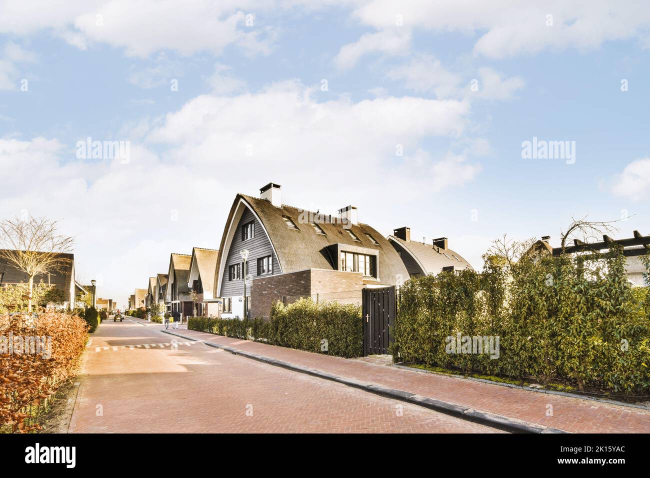 Facade of hut shaped building in residential district Stock Photo - Alamy