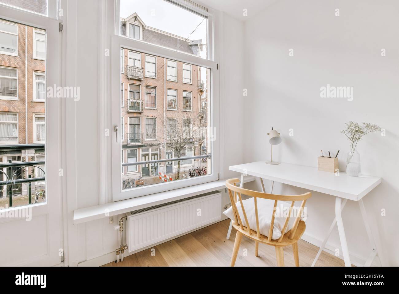 Interior of modern workplace room with whitewash walls and laminated ...