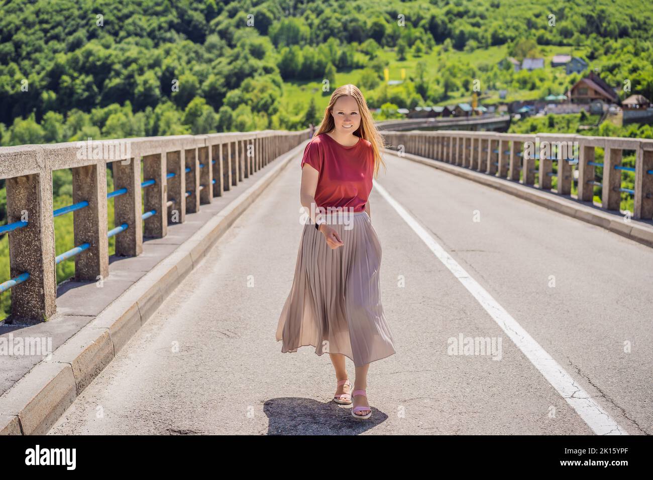 Montenegro. Woman tourist in background of Dzhurdzhevich Bridge Over ...