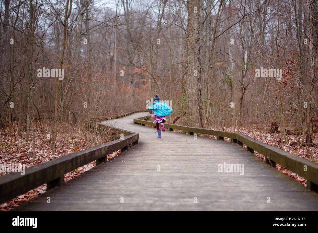 Bright coat little girl rear view hi-res stock photography and images ...