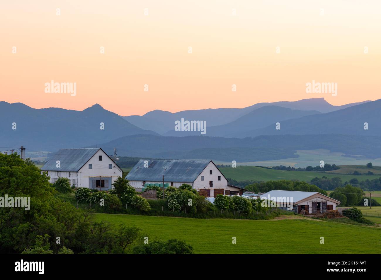 Farm at Bela Dulice village and Mala Fatra mountains, Slovakia Stock ...