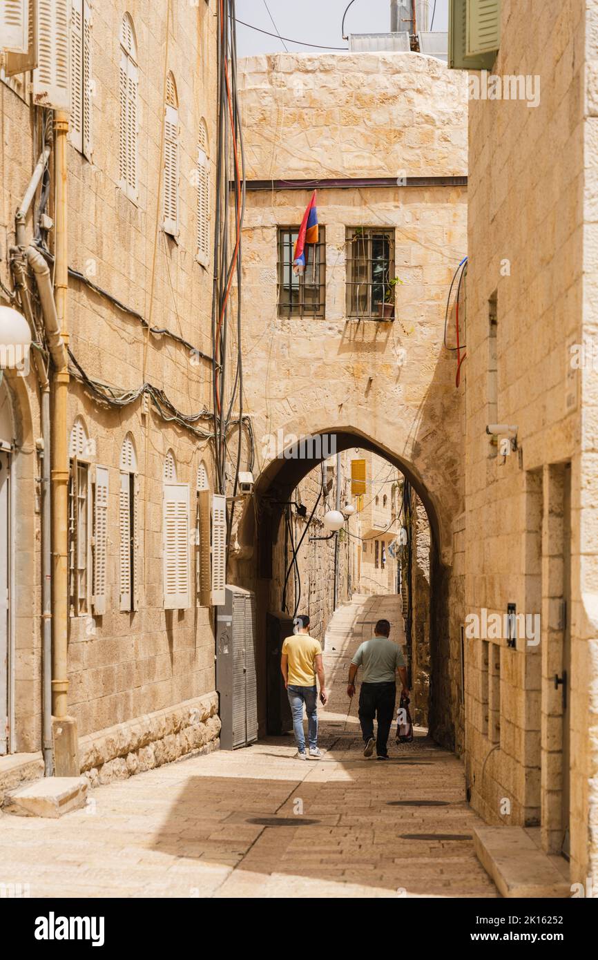 Walking through the alleys of Old City district of Jerusalem Stock ...