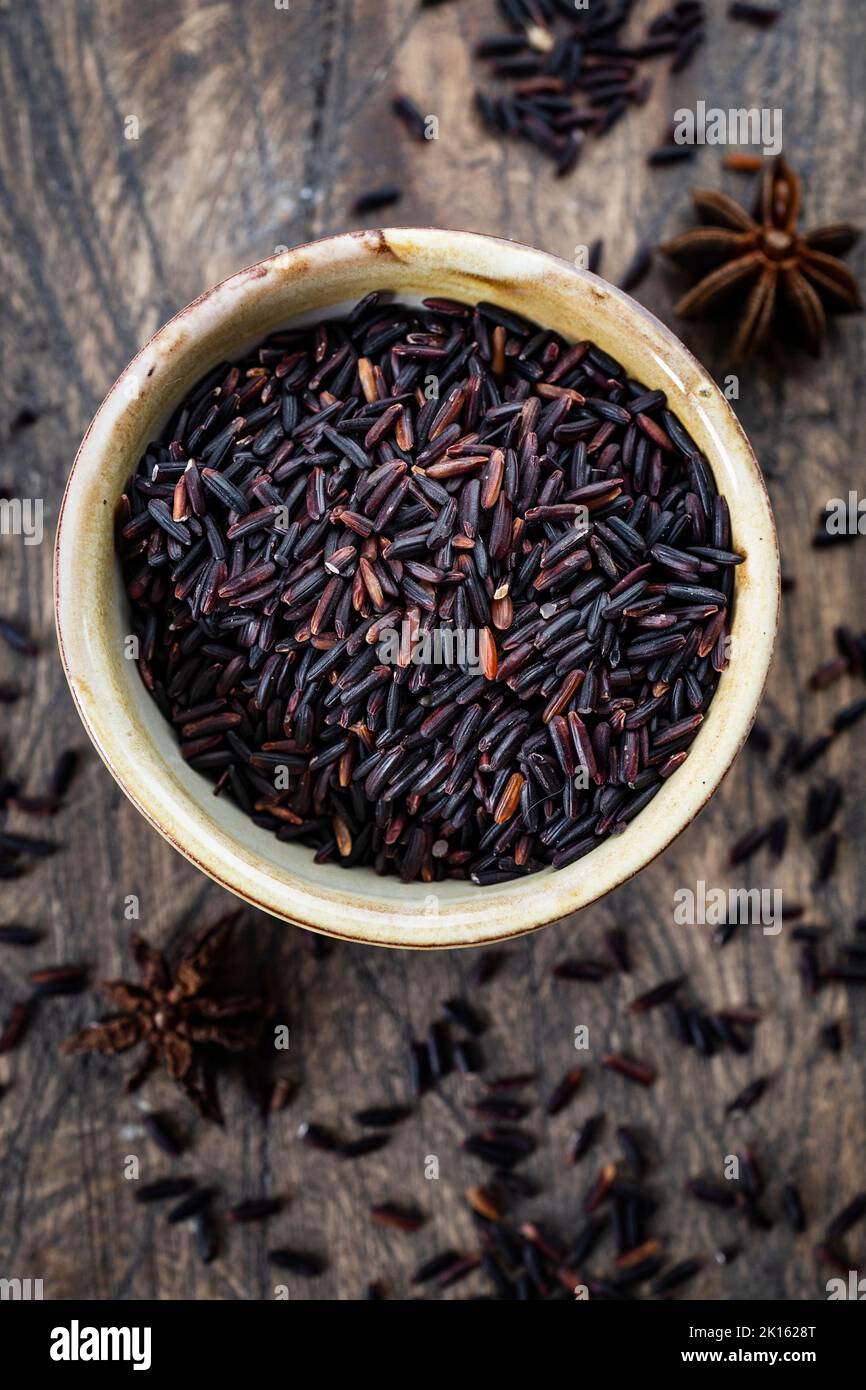 Black rice, also known as purple rice or forbidden rice Stock Photo - Alamy