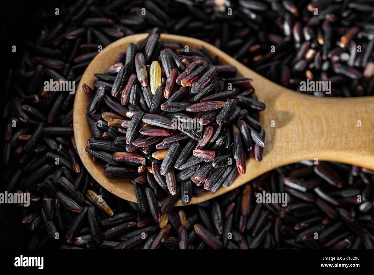 Black rice, also known as purple rice or forbidden rice Stock Photo - Alamy