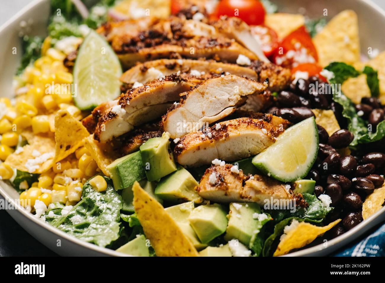Wide-angle close-up of a chicken taco salad Stock Photo - Alamy