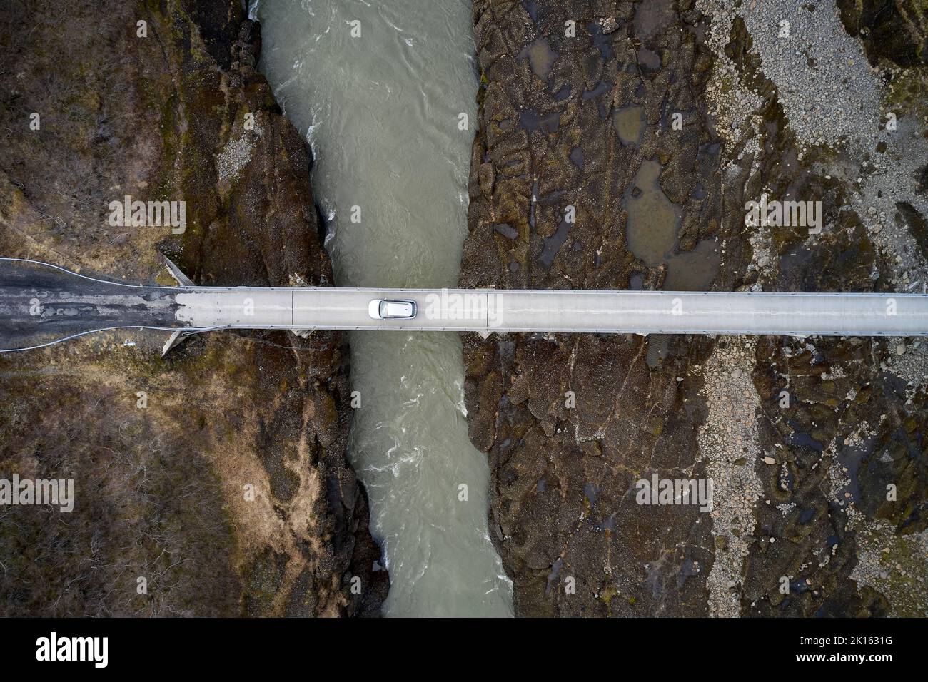 Car driving on bridge over river Stock Photo - Alamy