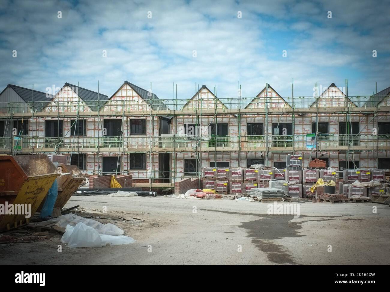 Scaffolding on New homes being built at a building site in Hampshire UK ...