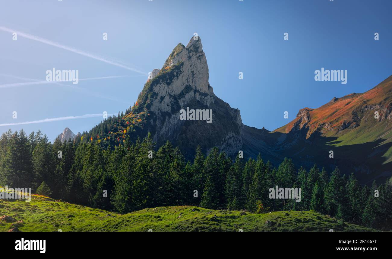 A low angle shot of a mountain peak on a sunny day Stock Photo - Alamy