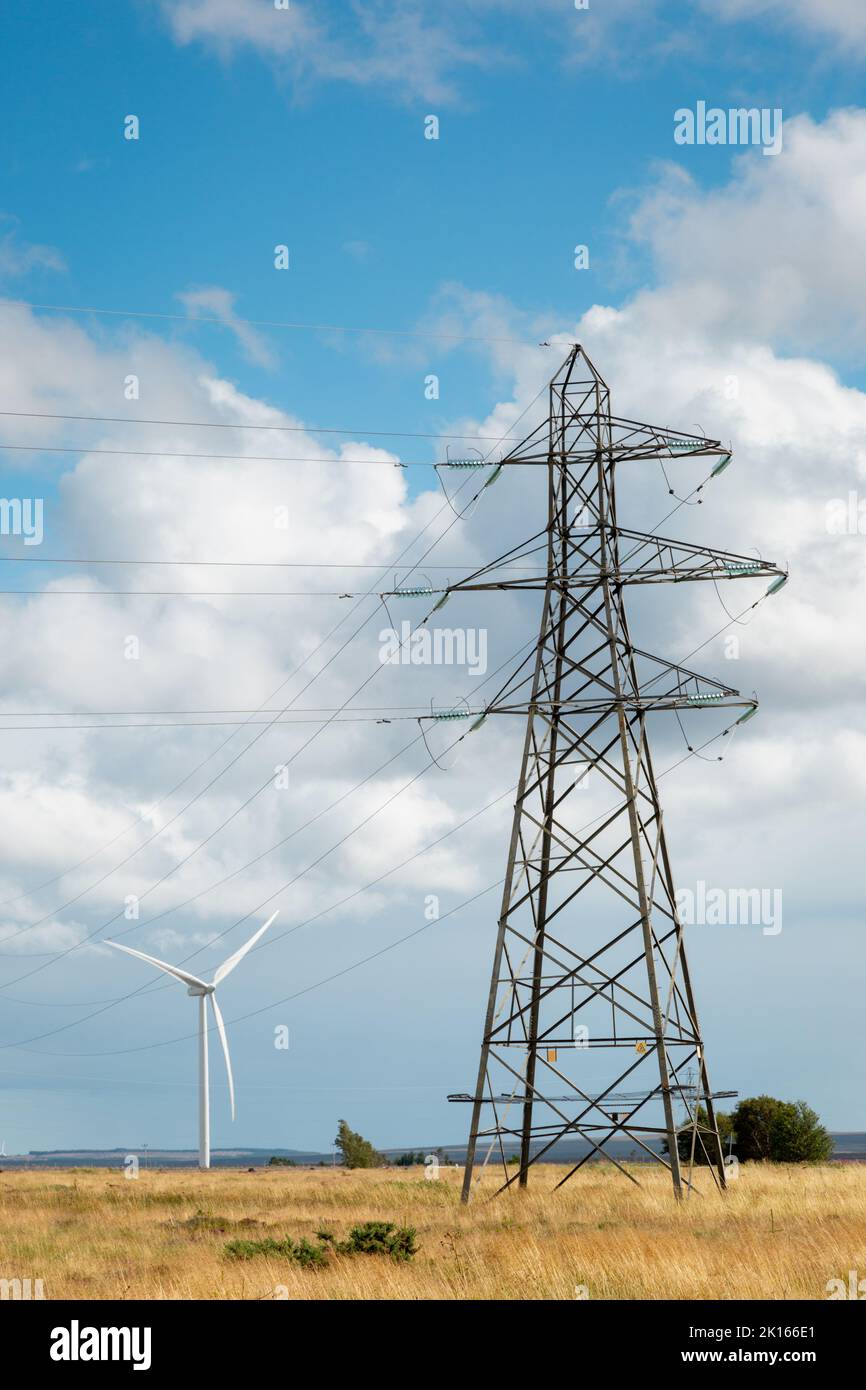 Electricity pylon and wind turbine, Scotland, UK 2022 Stock Photo - Alamy