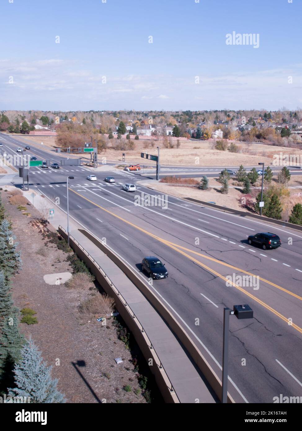 Road in suburb Stock Photo - Alamy