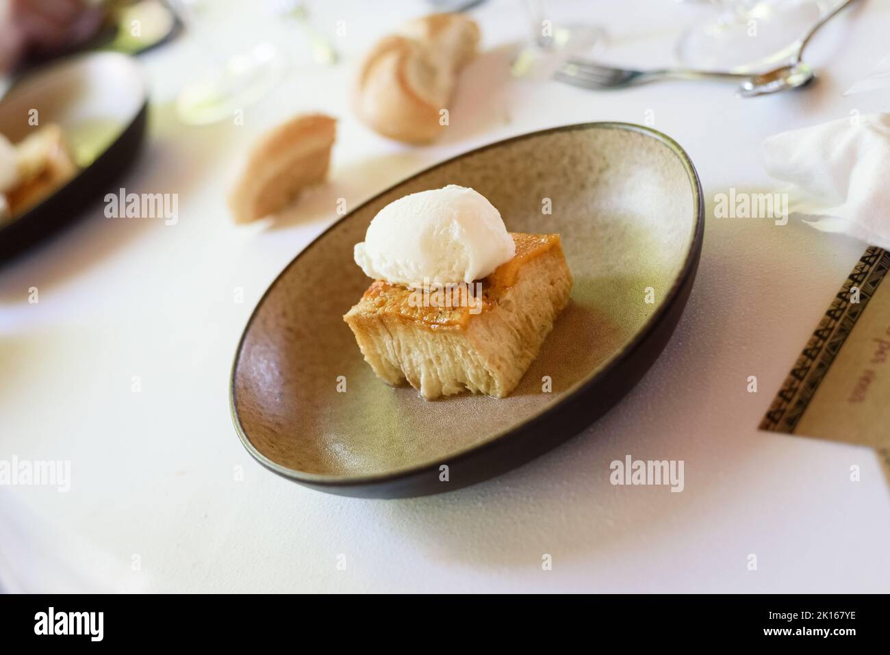 Traditional torrija brioche with vanilla ice cream, typical Spanish ...