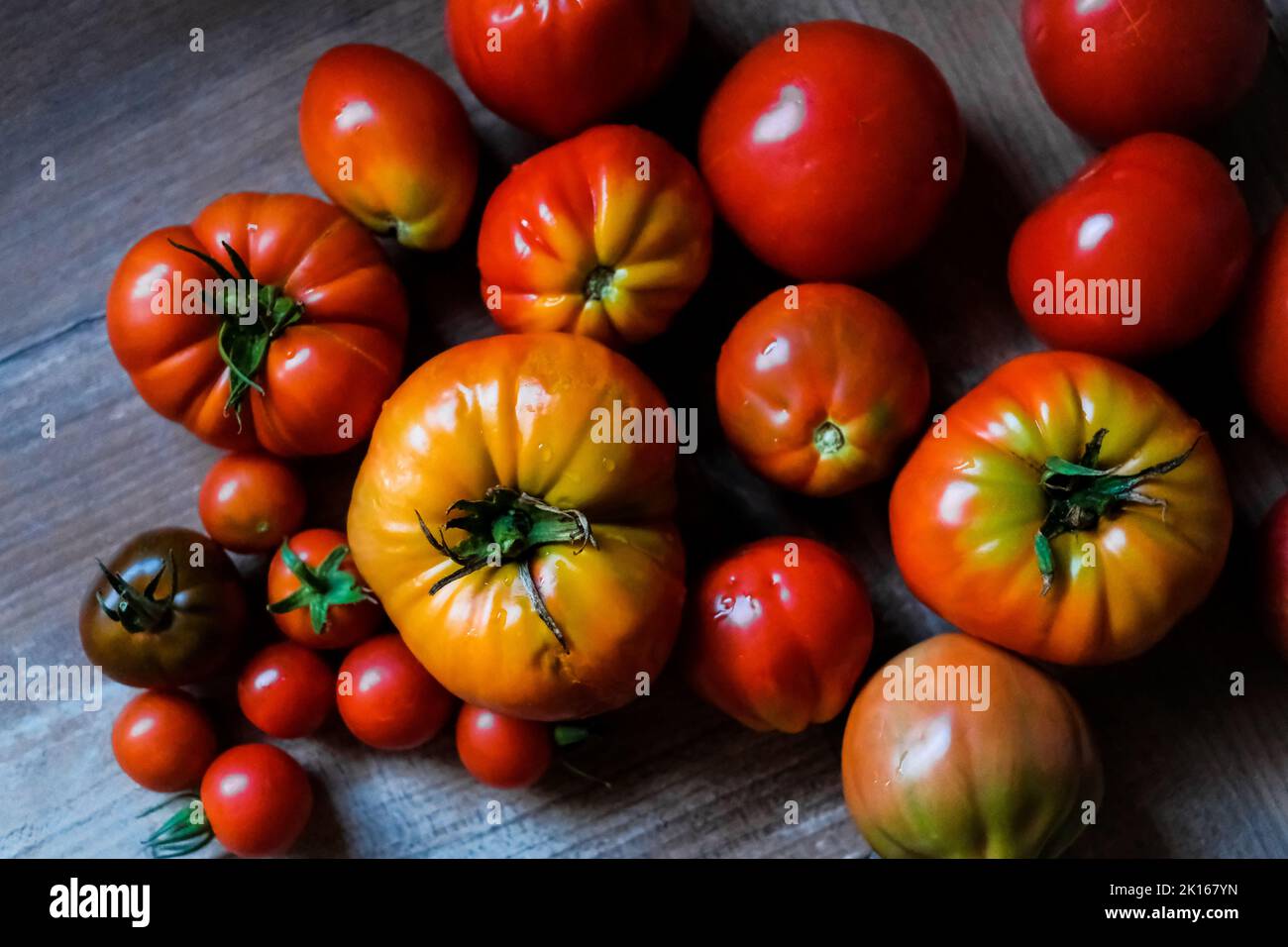 Heirloom large purple tomato hi-res stock photography and images - Alamy