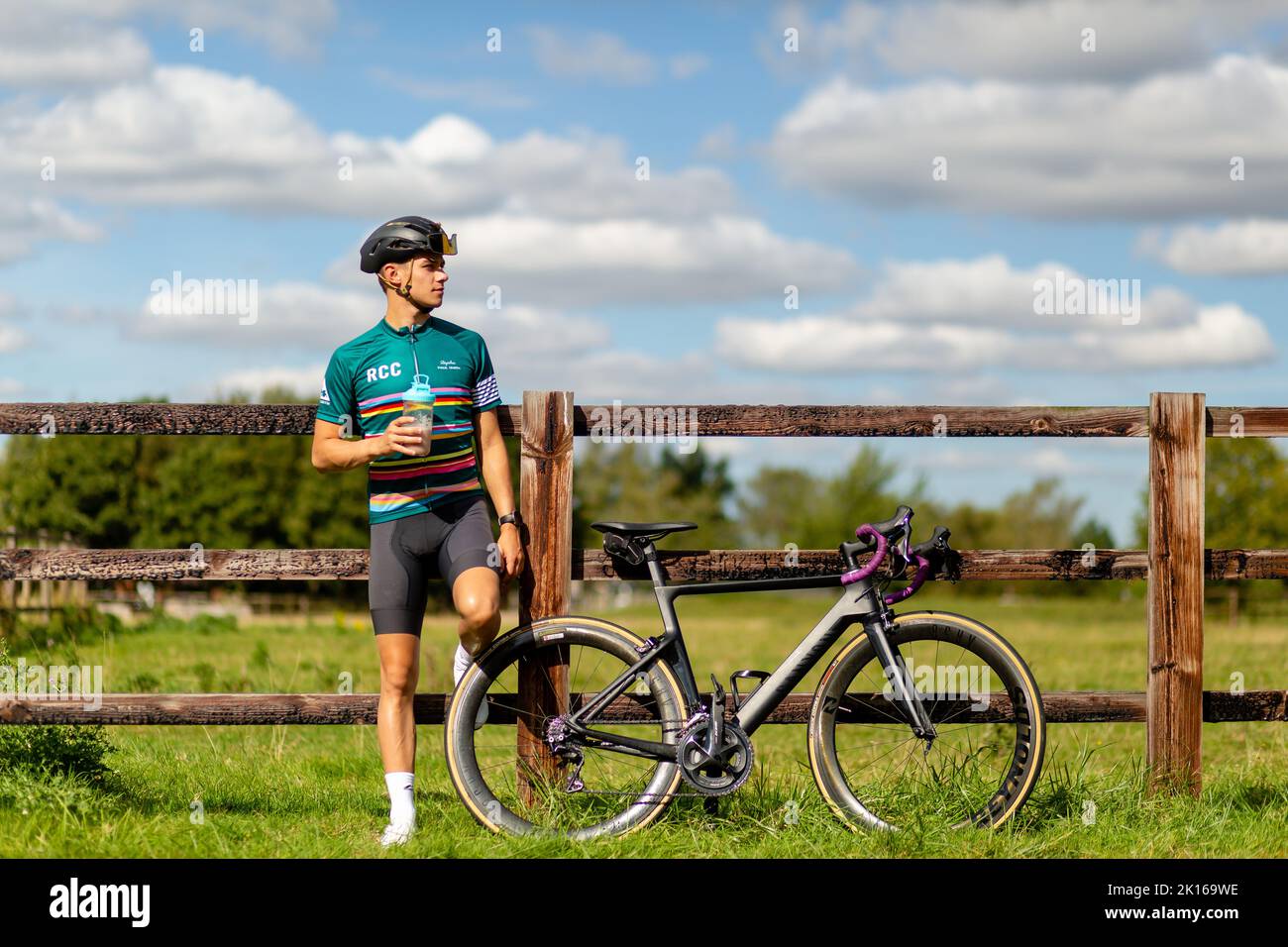 Male leaning on bike hi-res stock photography and images - Alamy
