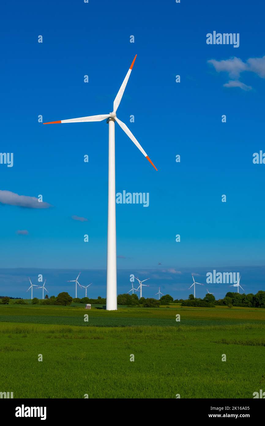 Wind generators in field.Natural renewable energy windmills.blades of ...