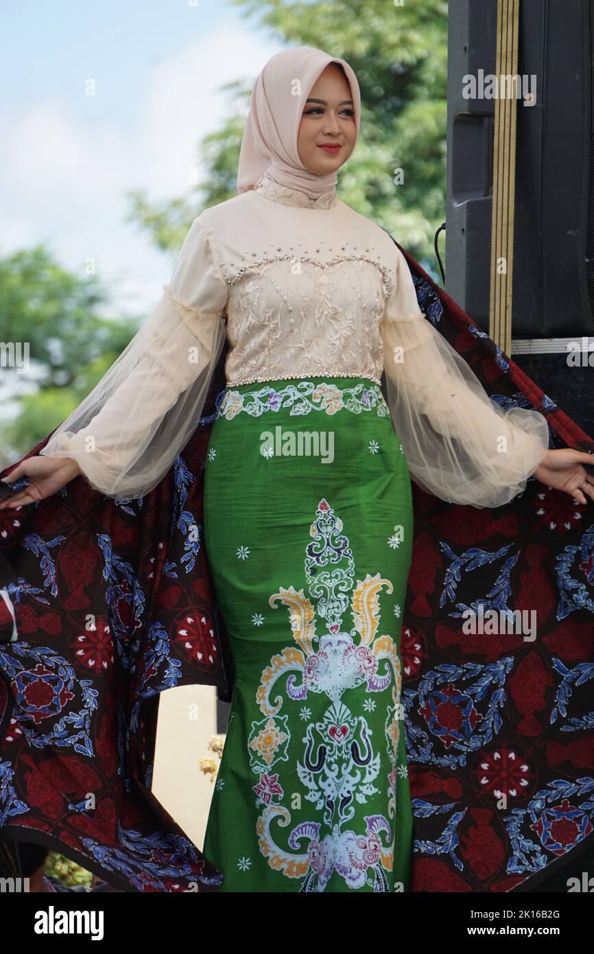 The beautiful Indonesian woman with traditional cloth which is called ...