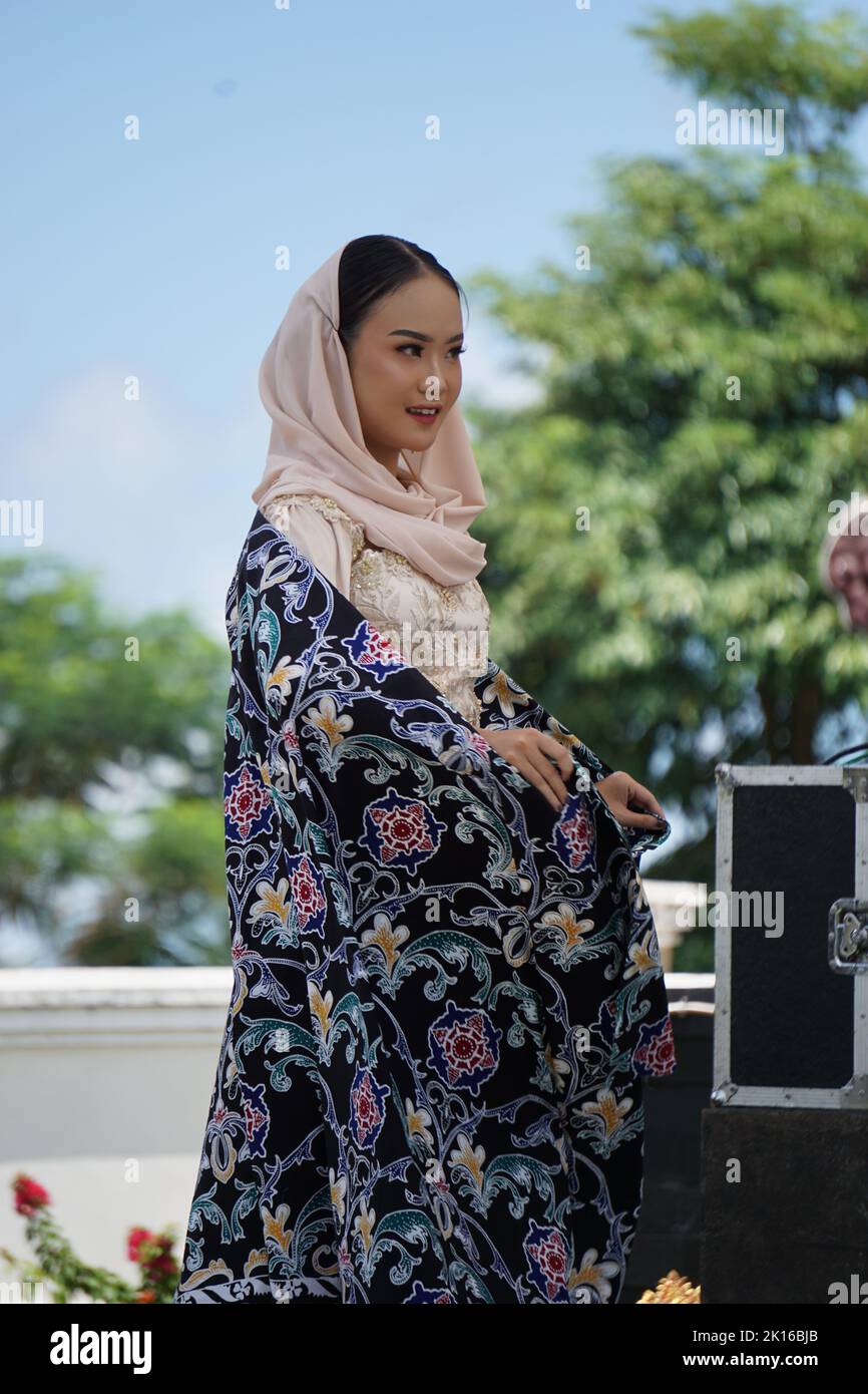 The beautiful Indonesian woman with traditional cloth which is called ...