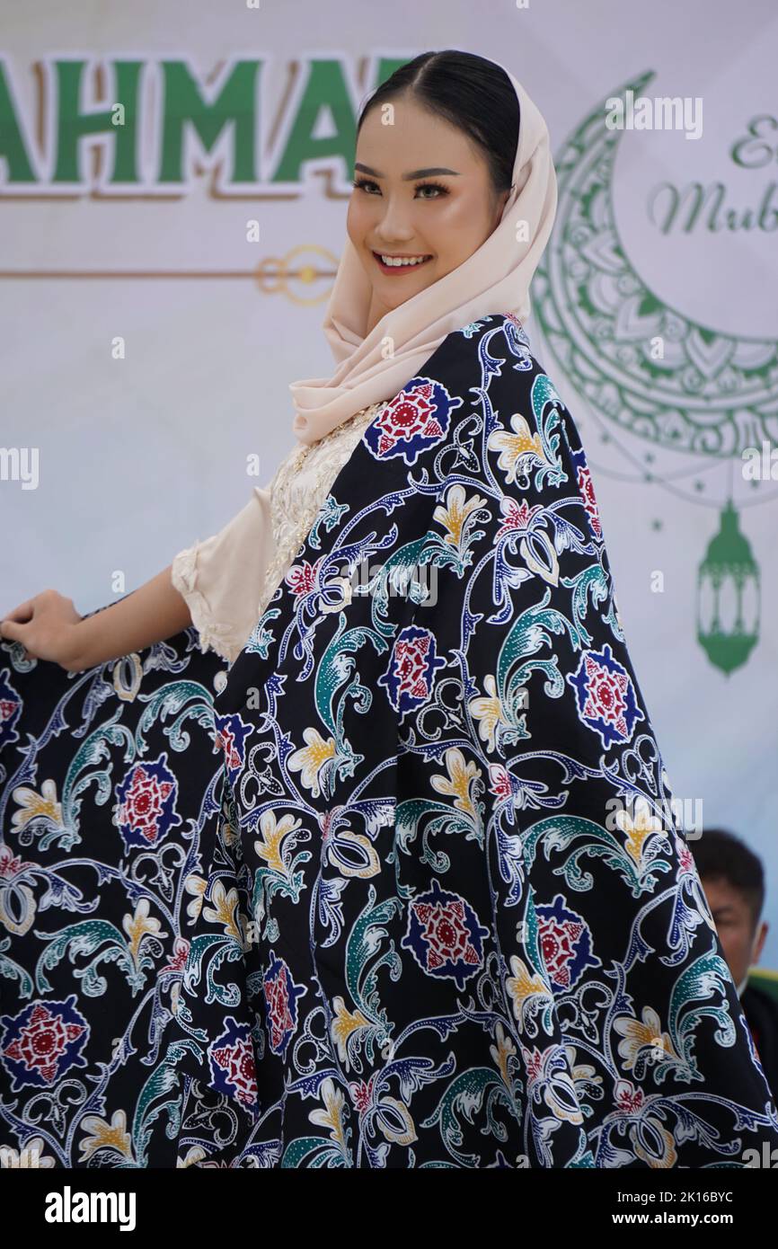 The beautiful Indonesian woman with traditional cloth which is called ...